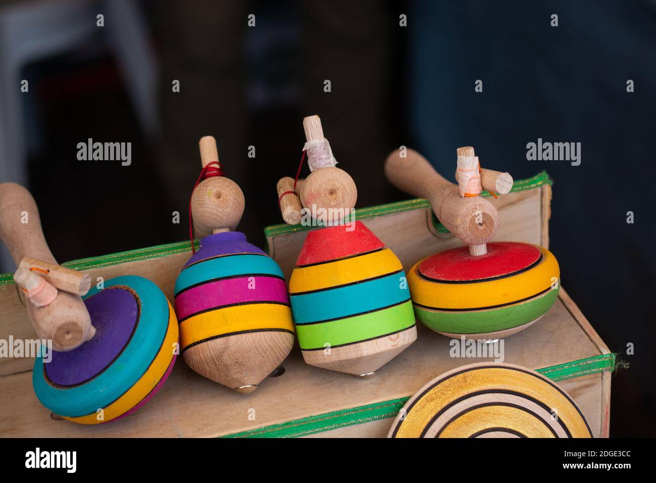 Leisure activities or handmade toys concept. pinning top or whirligig ...