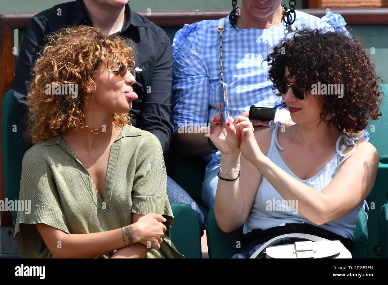 Singer Tal Benyerzi and her friend attend the French Tennis Open at ...