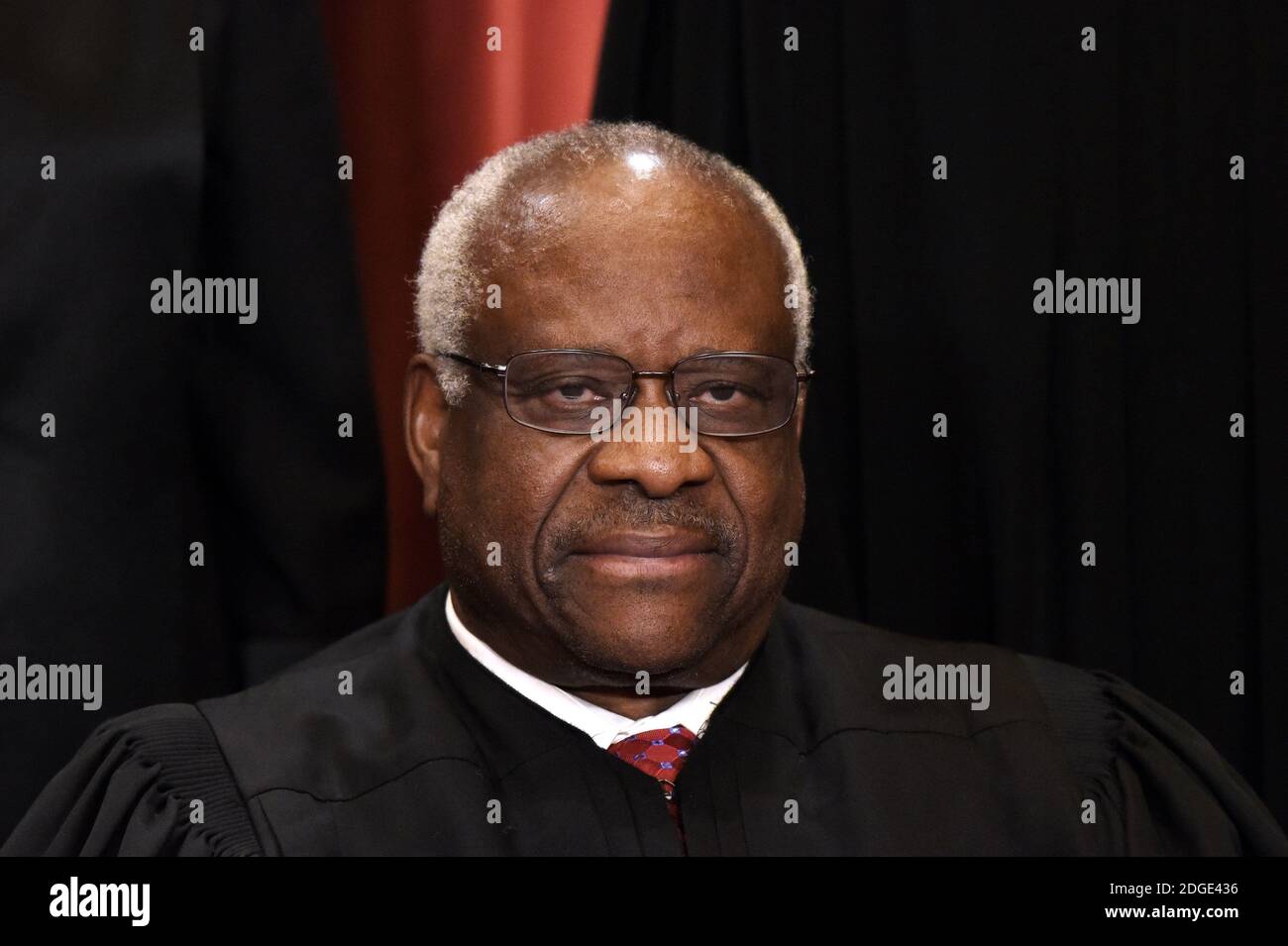 Associate Justice Clarence Thomas poses for a group photograph at the ...