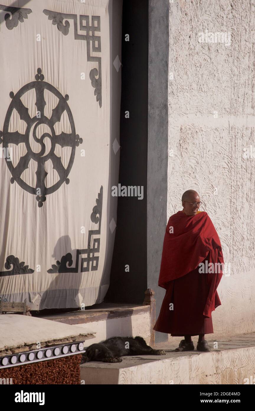 Early morning at Hemis monastery. A monk outside the prayer hall. Hemis ...
