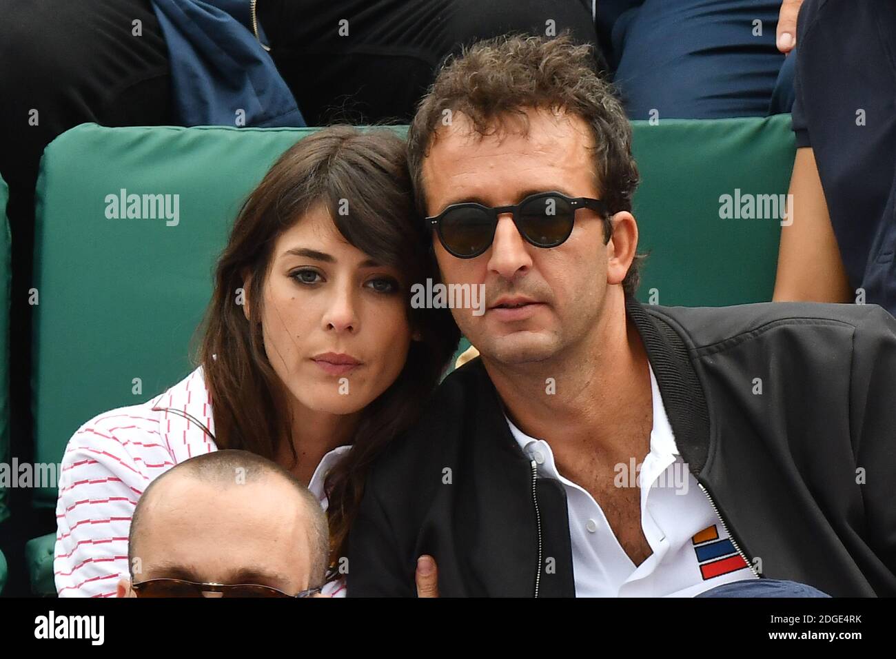 Cyril Eldin and Sandrine Calvayrac attend the French Tennis Open at ...