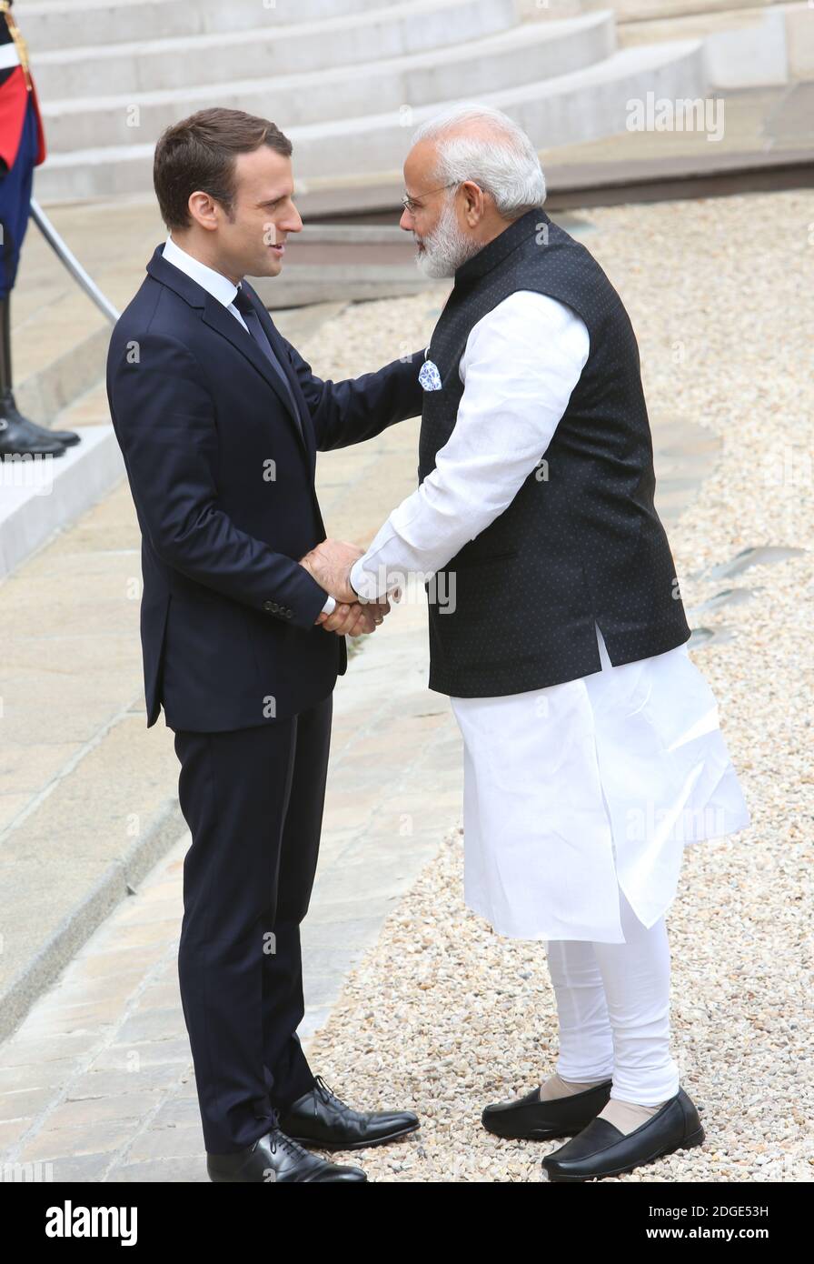 India's Prime Minister Narendra Modi is welcomed by French President ...