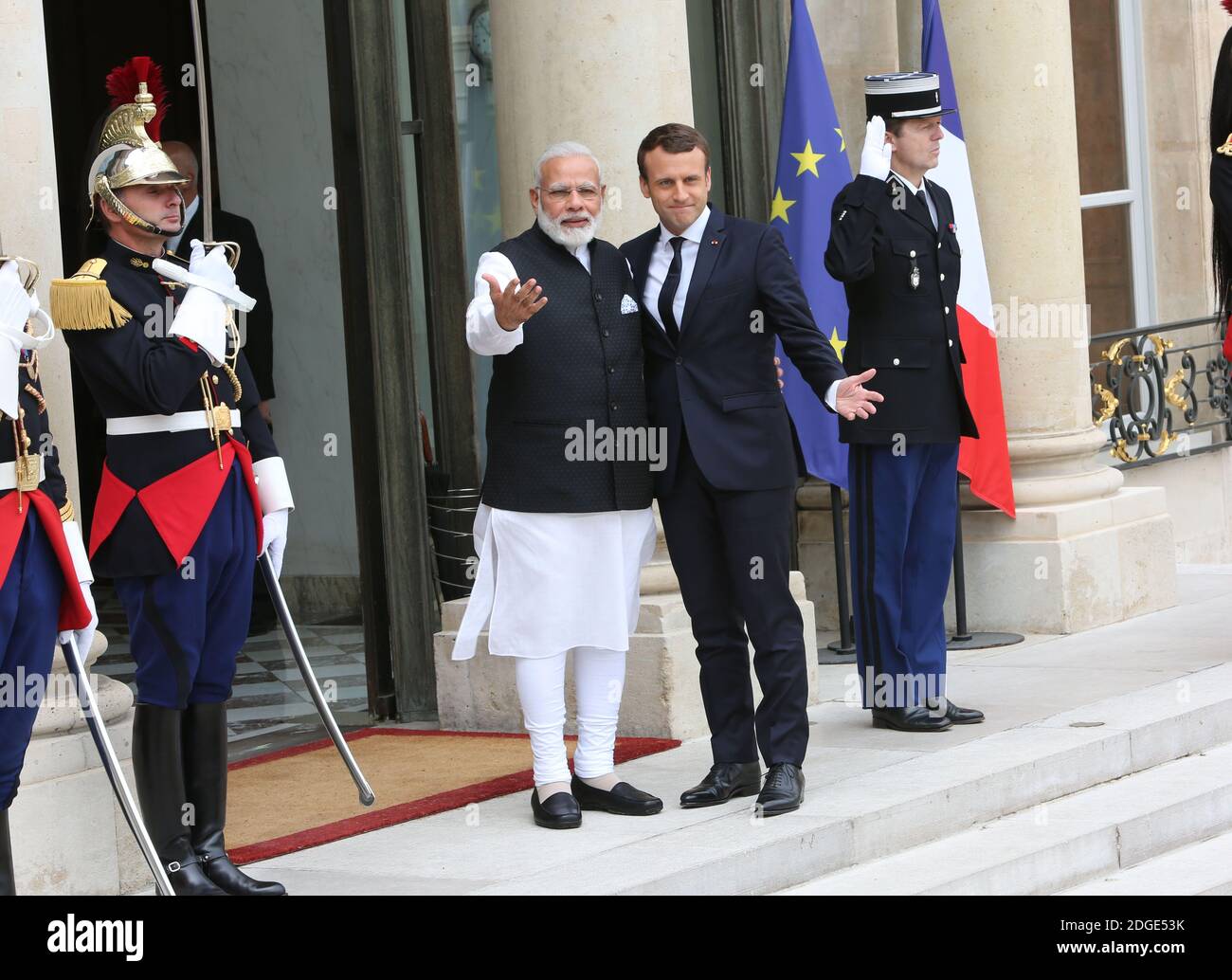 India's Prime Minister Narendra Modi is welcomed by French President ...