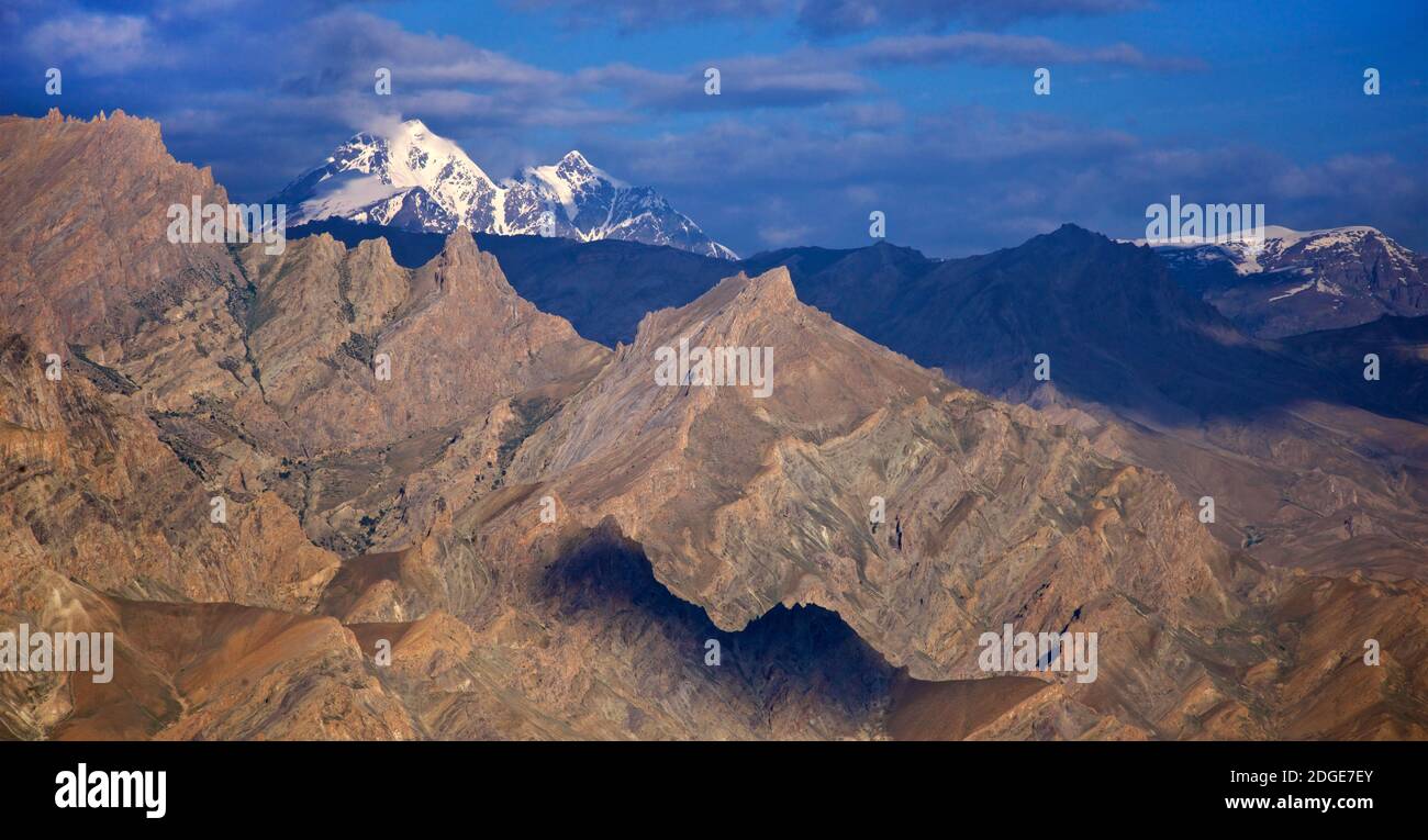 Dramatic landscape. Morning sunlight illuminates the mountain peaks ...