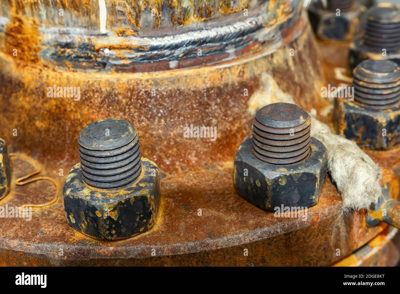 The cover of the old rusty heat exchanger covered with the same rusty ...