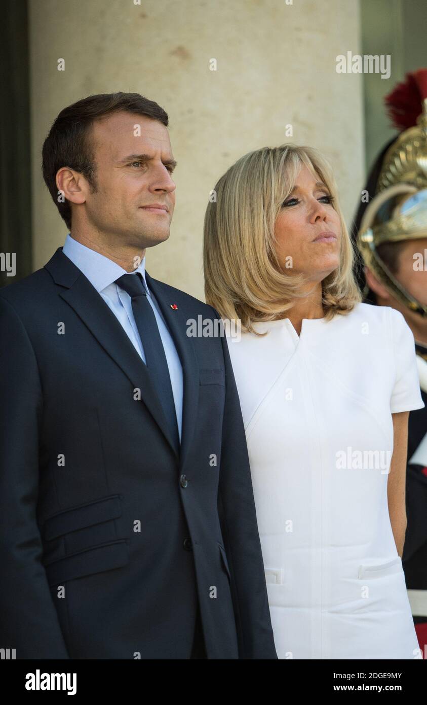 French president Emmanuel Macron and his wife Brigitte Macron are ...