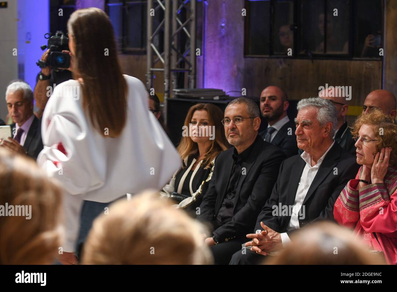 Fashion designer Elie Saab (center) and wife Claudine attend the ...