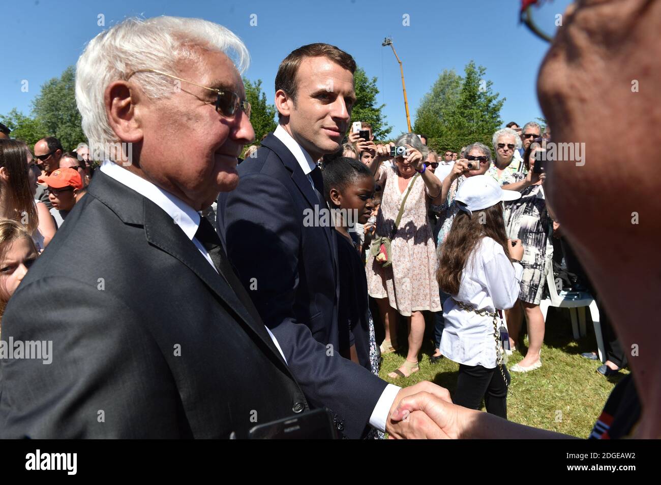 French president Emmanuel Macron and last survivor Robert Hebras attend ...