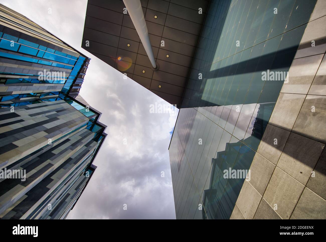 Skyward view of modern city buildings in Augustusplatz, Leipzig ...