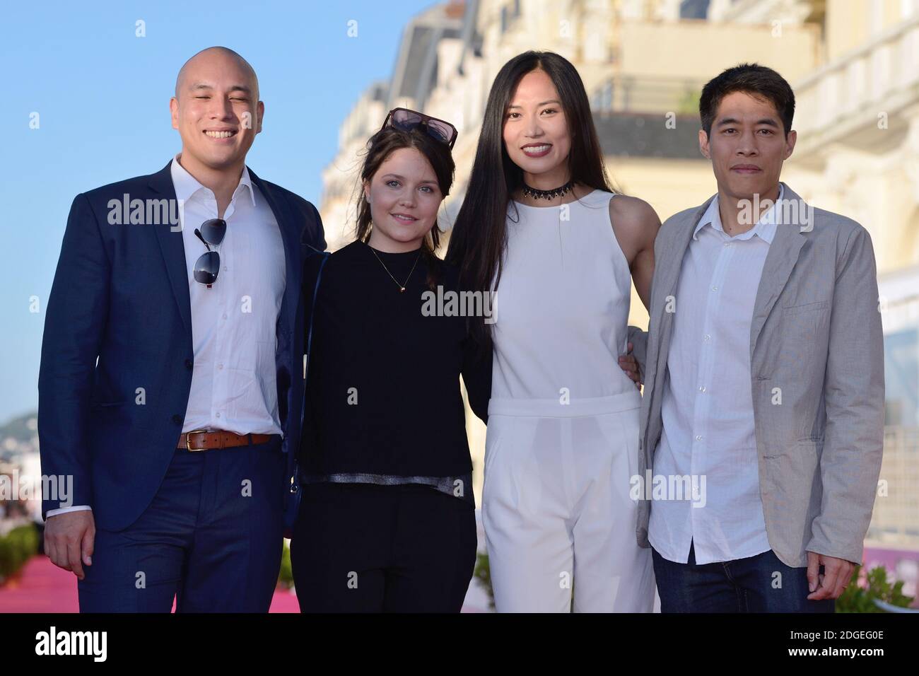 Xin Wang, Audrey Bastien and Frederic Siuen attending the Red Carpet ...