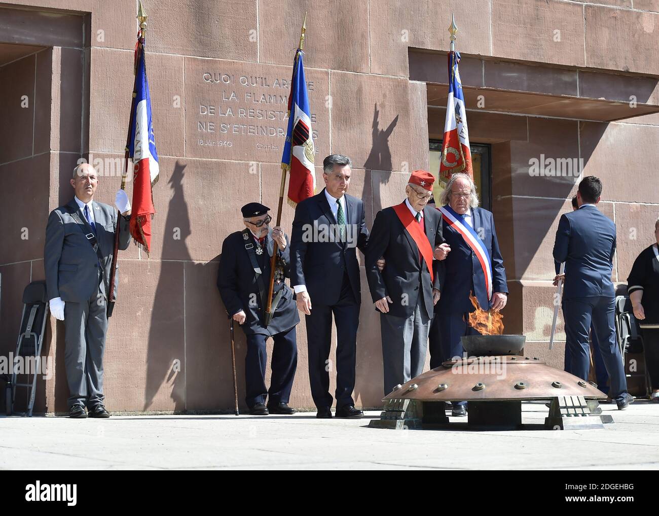 French President Emmanuel Macron attends a ceremony marking the 77th ...