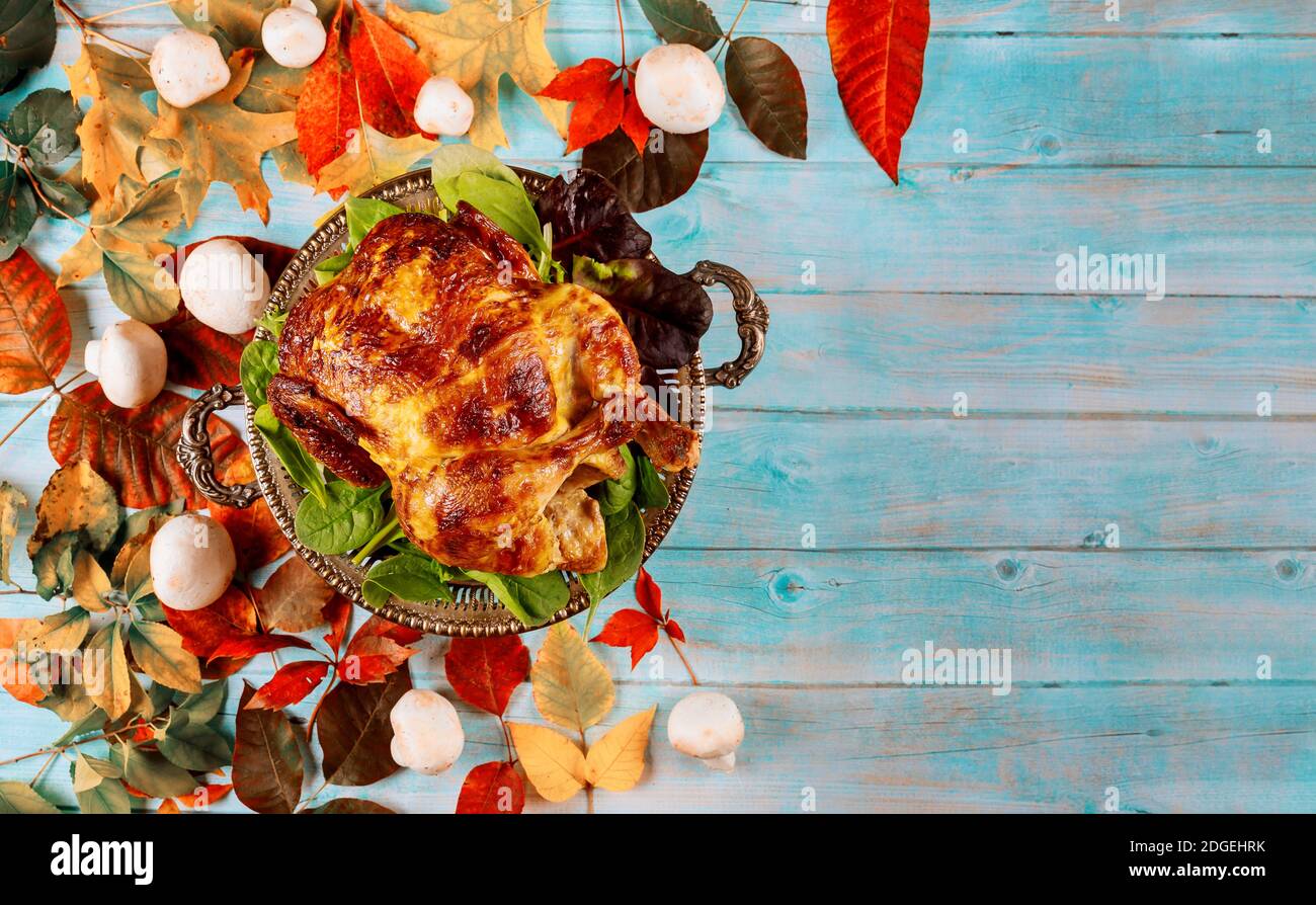 Golden roast chicken with thanksgiving celebration dinner Stock Photo ...