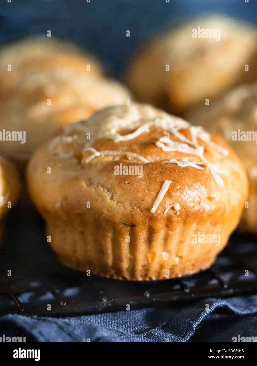 Salted muffins with cream cheese, topping parmesan Stock Photo - Alamy