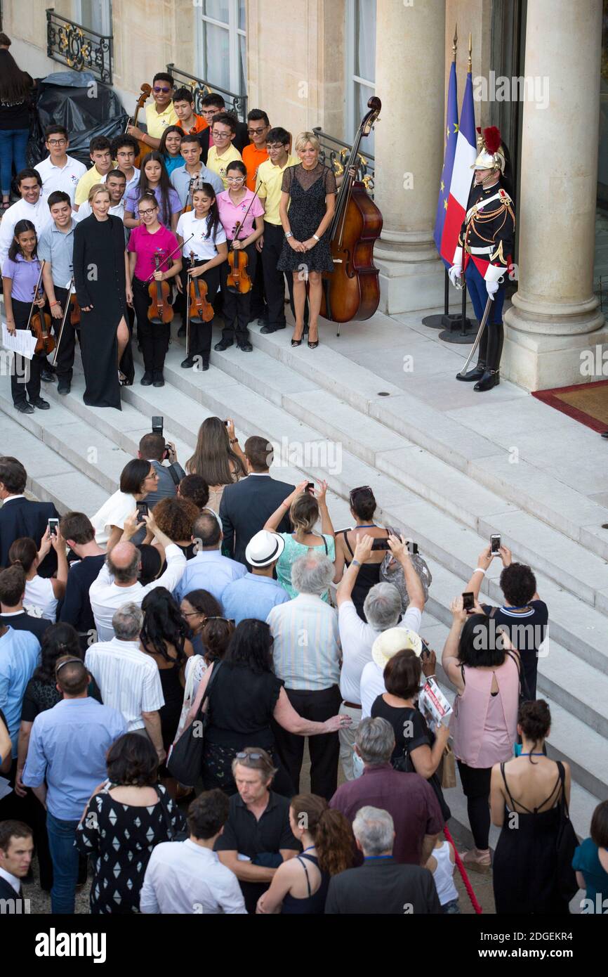 French President Emmanuel Macron and his wife Brigitte receiving ...