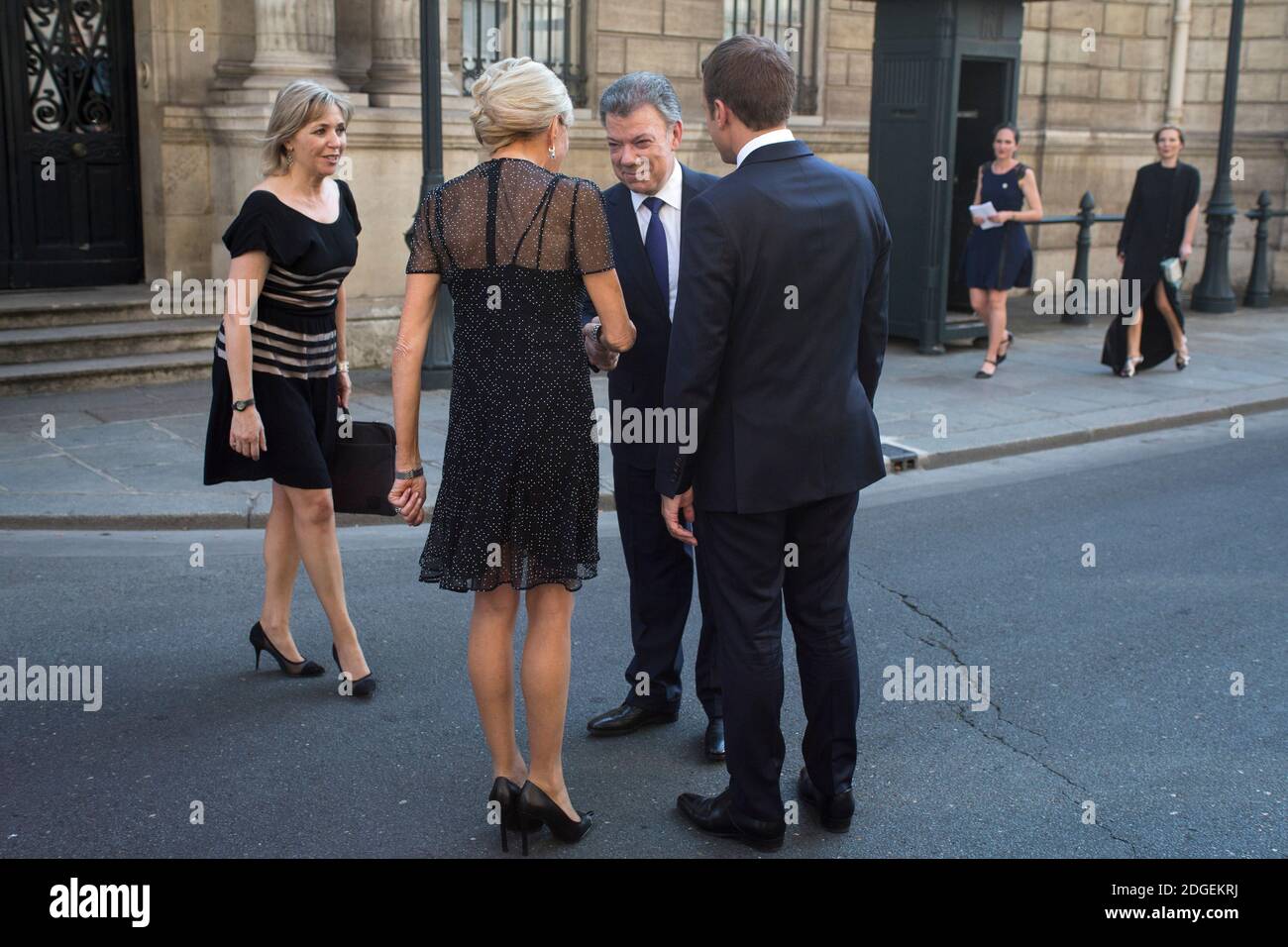 French President Emmanuel Macron and his wife Brigitte receiving ...