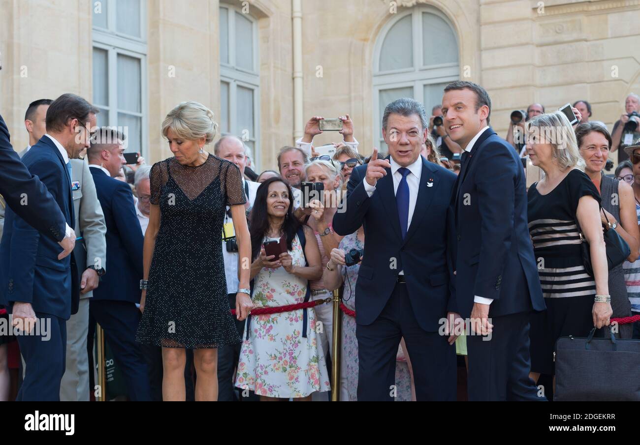 Brigitte Macron, Juan Manuel Santos, and Emmanuel Macron.Colombian ...