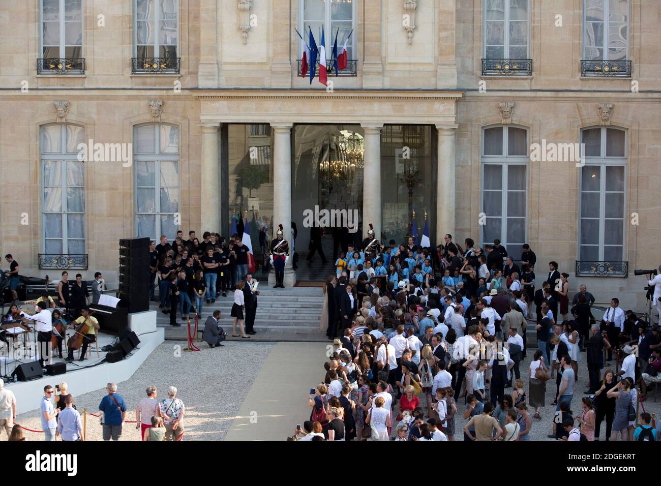French President Emmanuel Macron and his wife Brigitte receiving ...