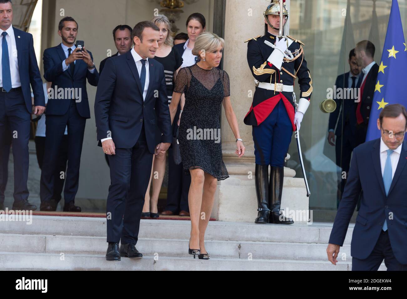 Emmanuel Macron and his wife Brigitte.Colombian president Juan Manuel ...