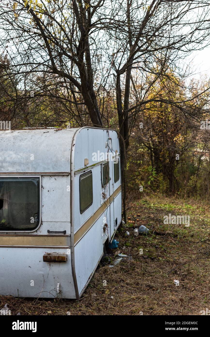 Abandoned caravan RV motorhome in the woods symmetry contrast sharp ...