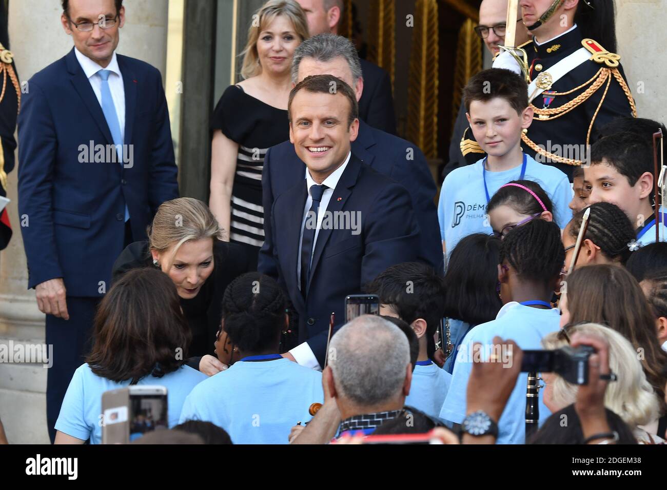 French President Emmanuel Macron and his wife Brigitte receiving ...