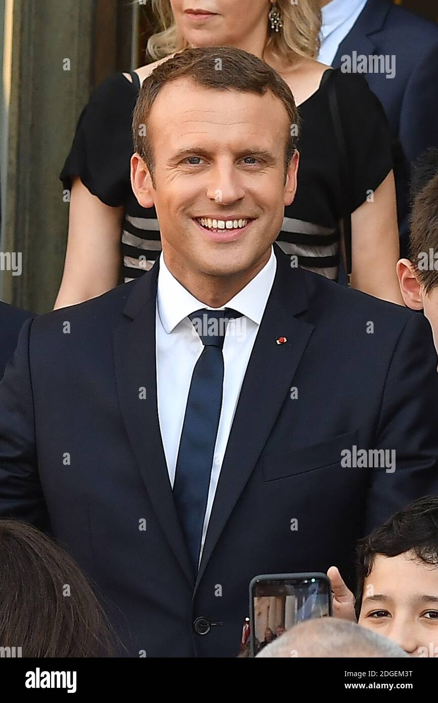 French President Emmanuel Macron and his wife Brigitte receiving ...