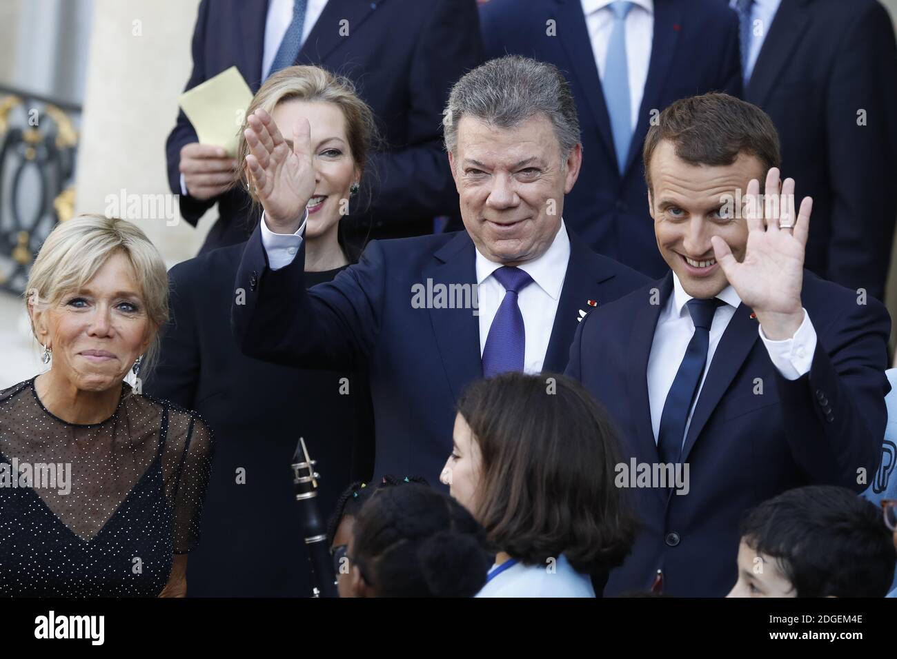 French President Emmanuel Macron and his wife Brigitte receiving ...