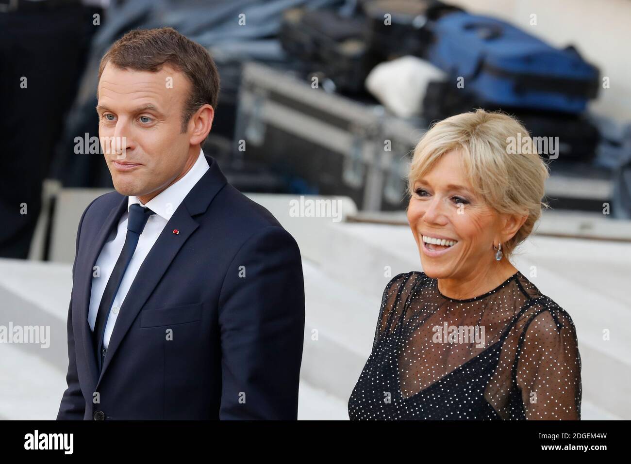 French President Emmanuel Macron and his wife Brigitte receiving ...
