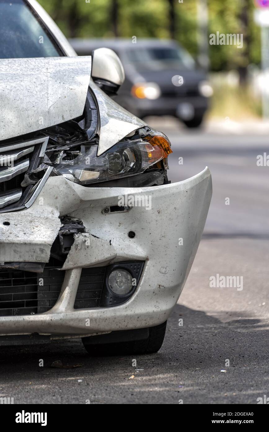 Car at the roadside after an accident Stock Photo - Alamy