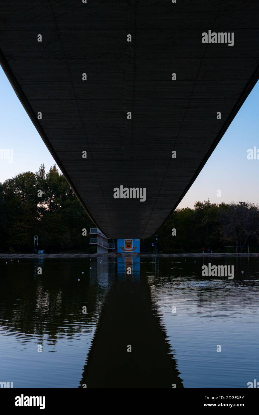 Bridge over deep blue water rowing canal with copy space for text Stock ...