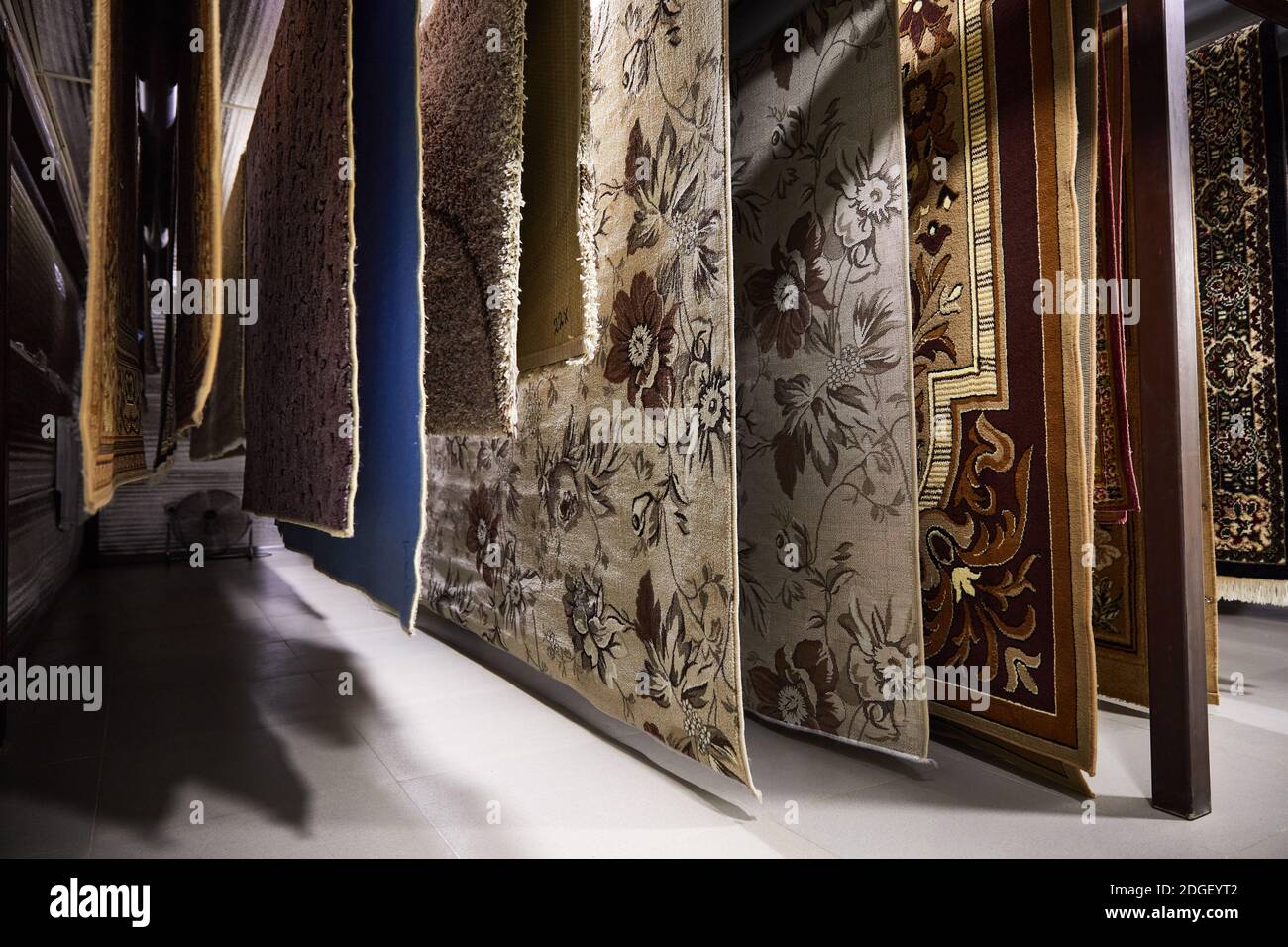 Carpets hanging on racks hi-res stock photography and images - Alamy