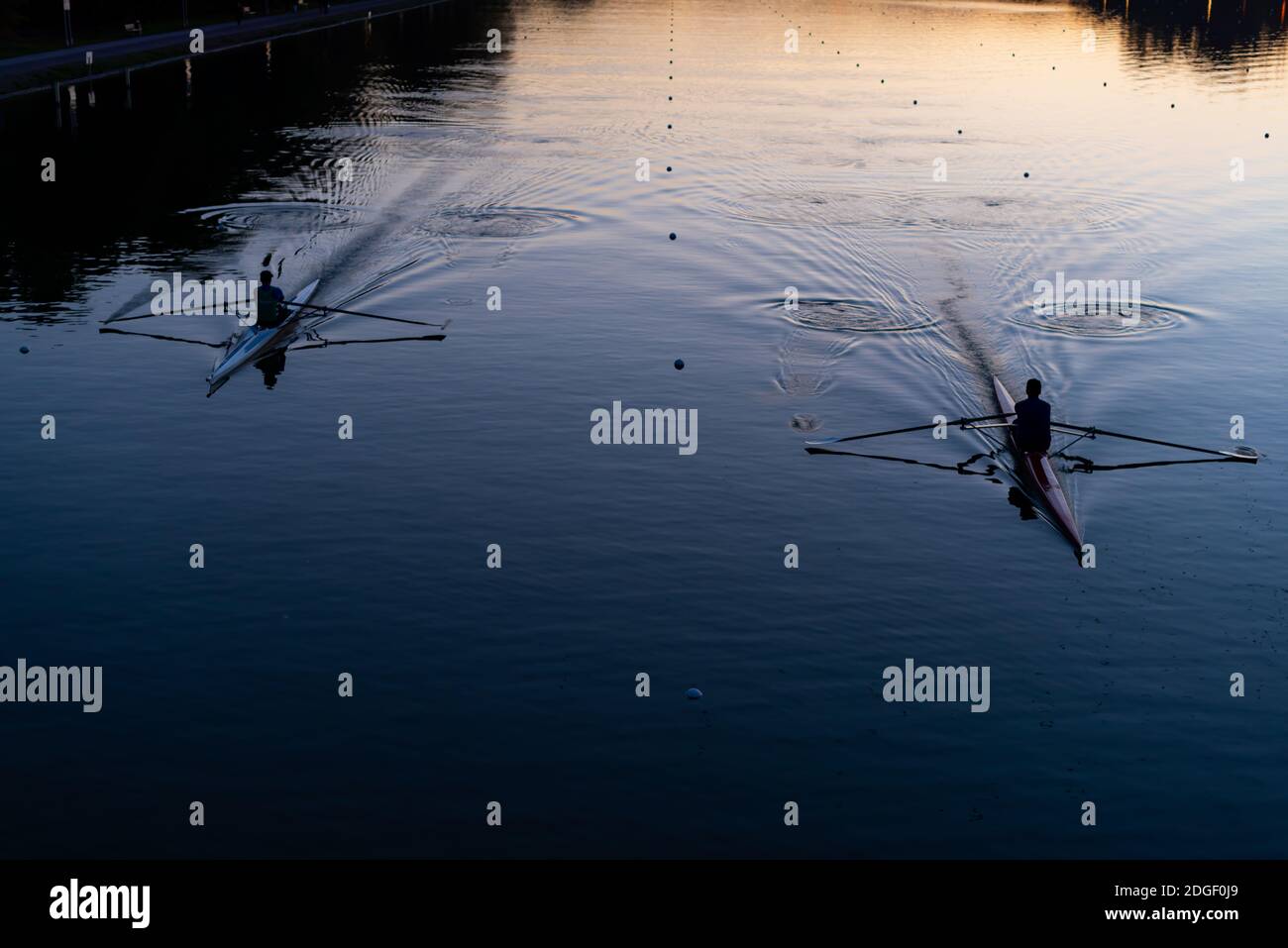Kayaks racing in canal water reservoir for rowing sport practice on ...