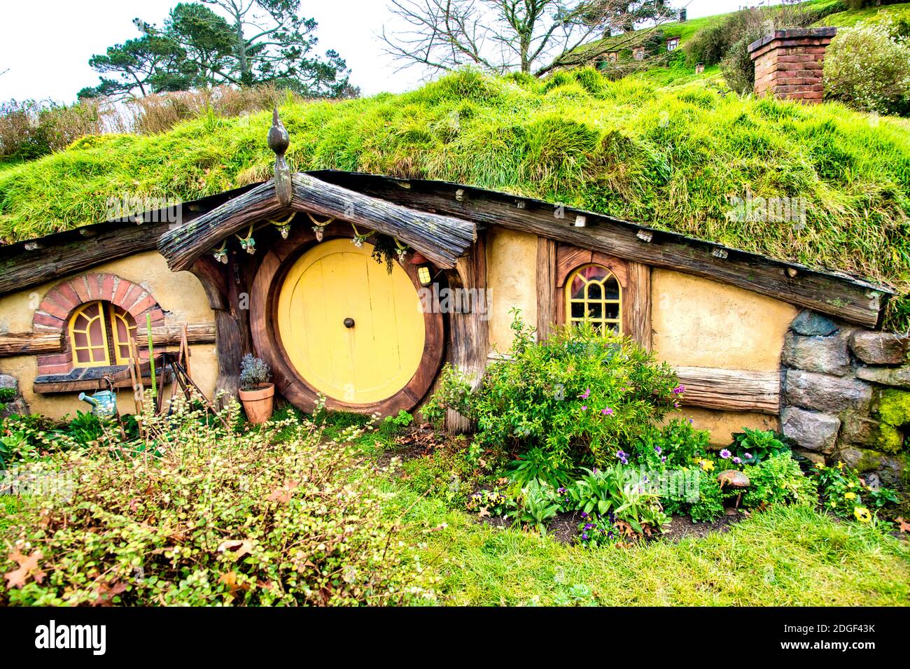 Beautiful Hobbiton Movie Set Village in New Zealand. Wooden homes in ...