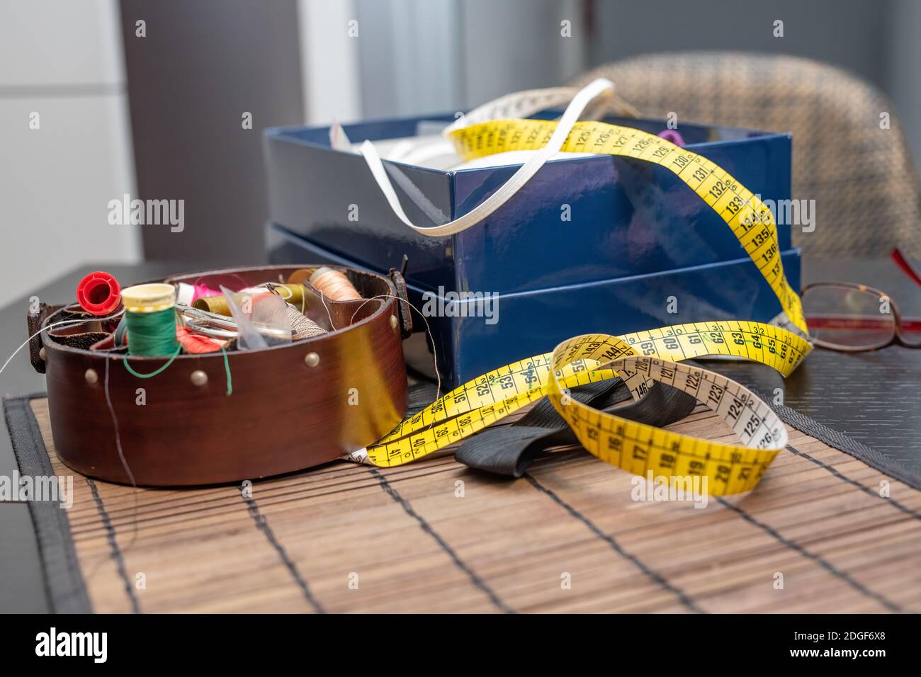 Yellow meter with other sewing instruments for tailoring work Stock ...