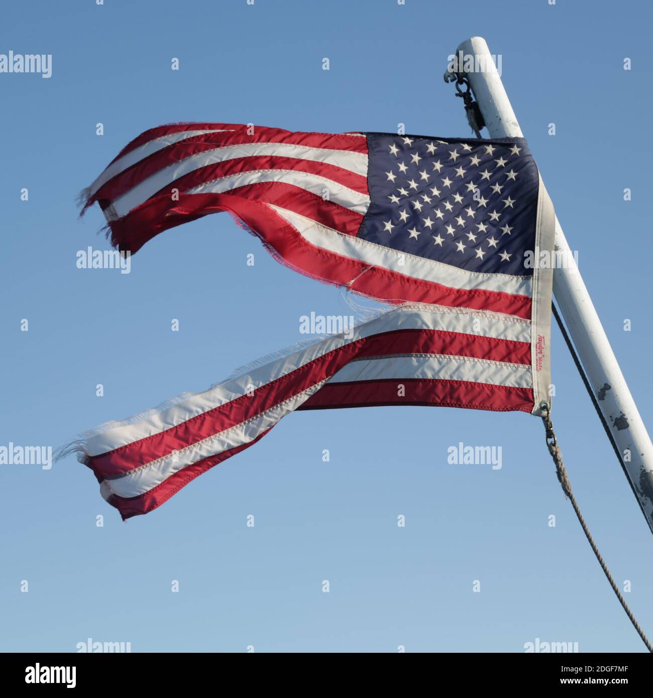 USA the waving flag in the sky Stock Photo - Alamy