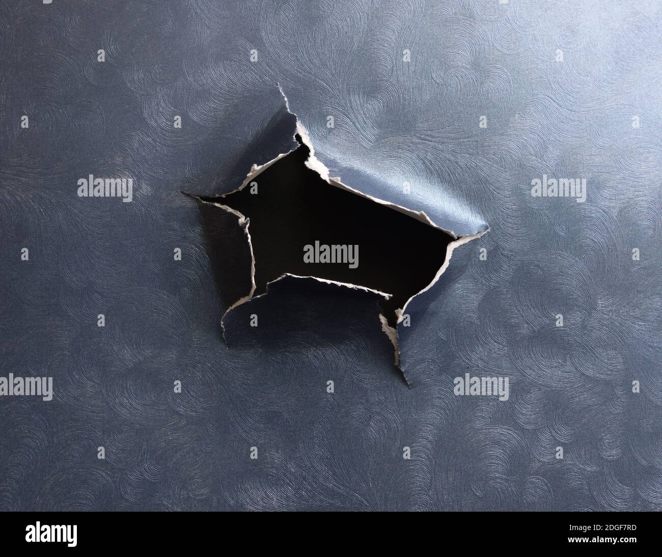 Torn paper hole hi-res stock photography and images - Alamy