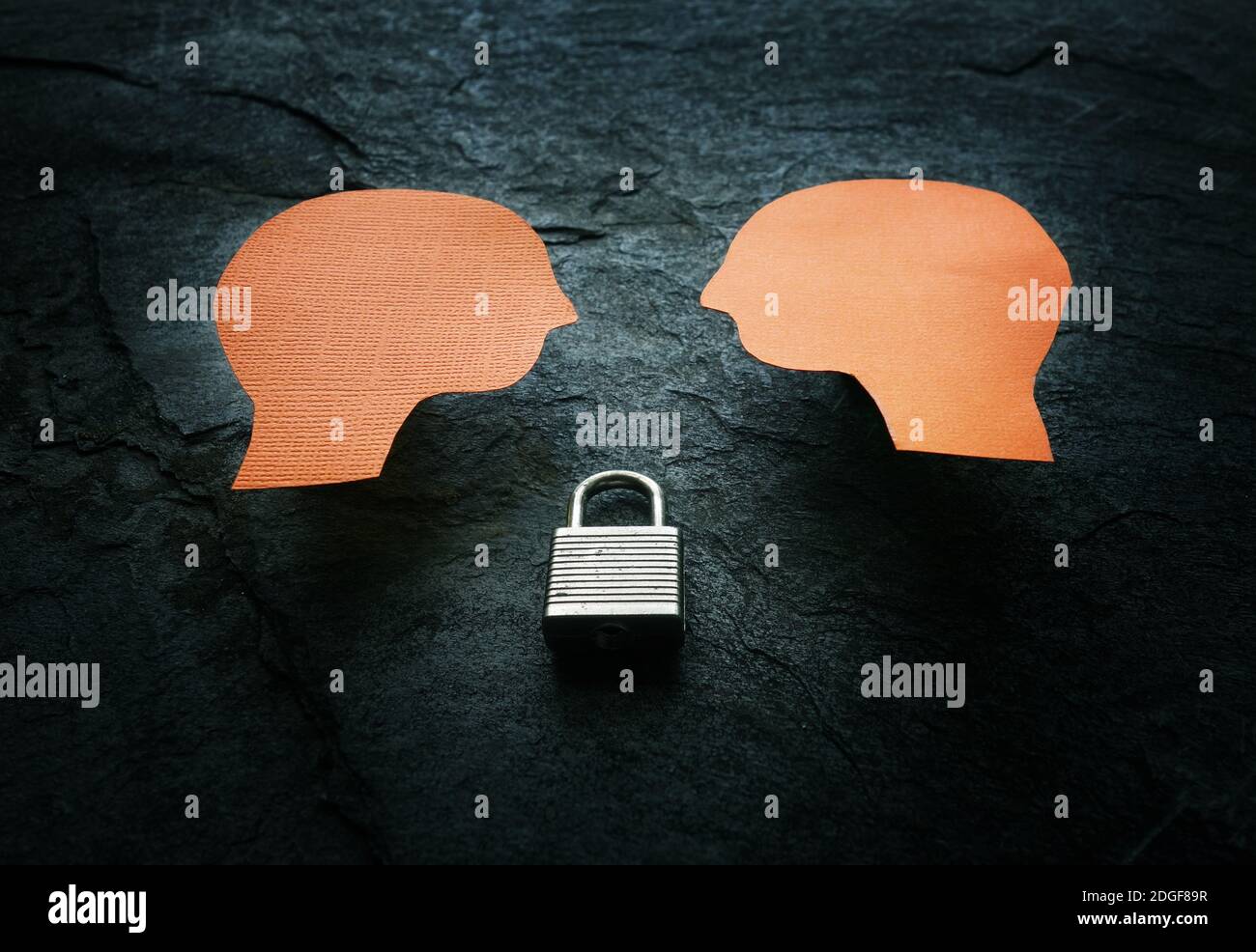 Two heads and lock Stock Photo - Alamy