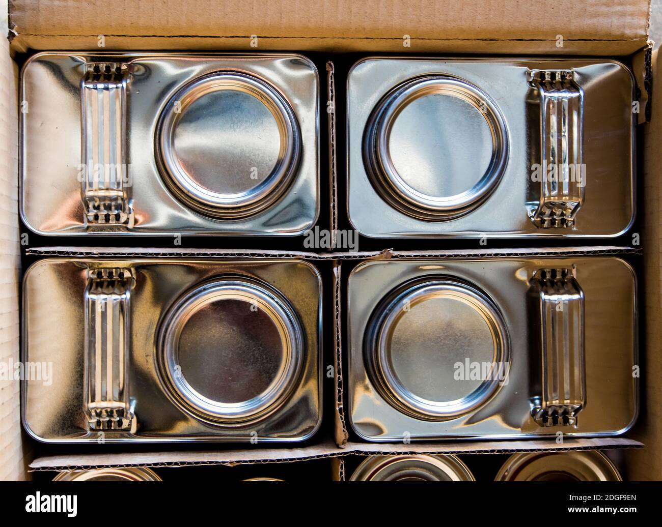 Metal packaging of chemical contents in paper box Stock Photo - Alamy