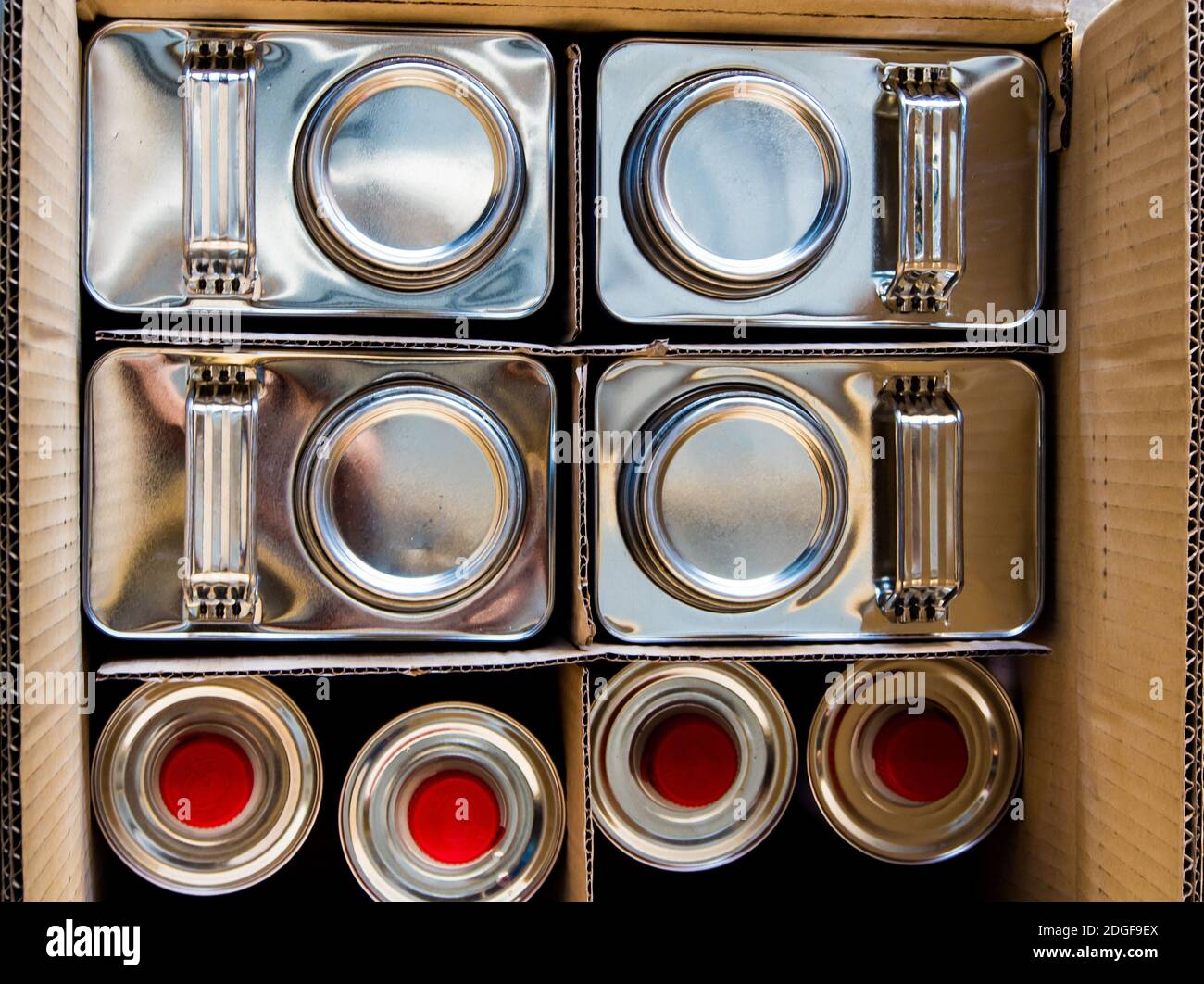 Metal packaging of chemical contents in paper box Stock Photo - Alamy