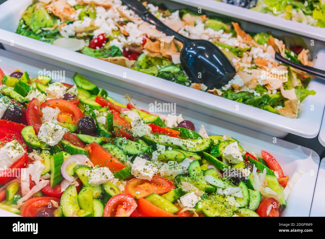 Assortment of fresh vegetable salads in restaurant buffet Stock Photo ...
