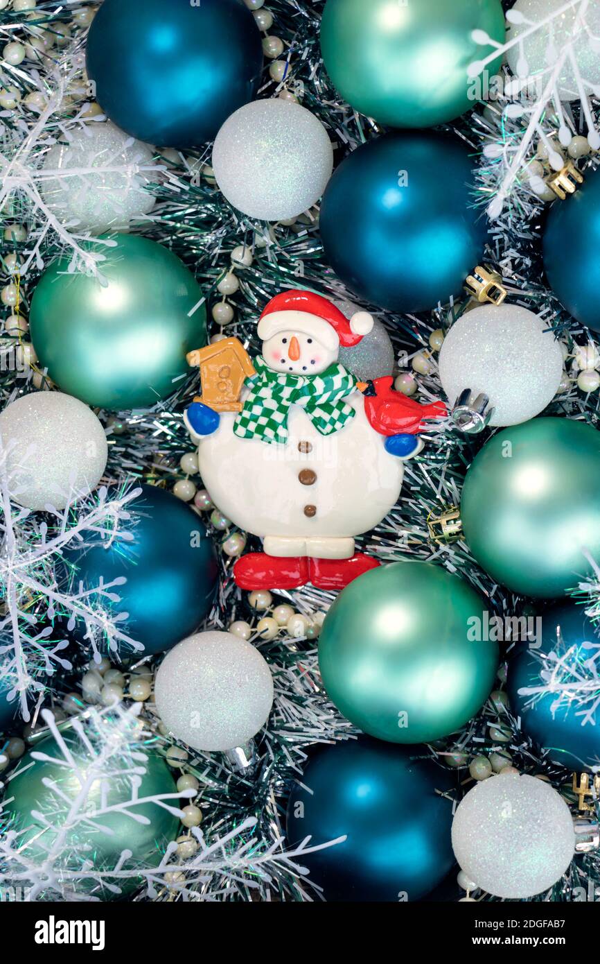 Close up of blue Christmas balls with snowman and snowflakes. Christmas ...