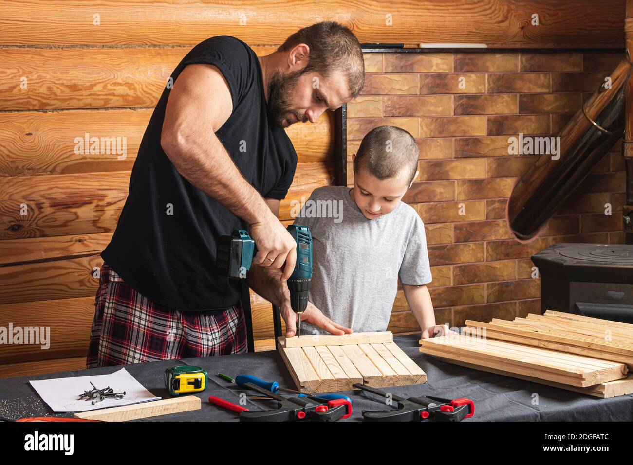 Child using a hammer hi-res stock photography and images - Alamy