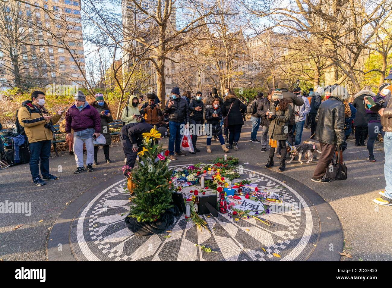 New York, NY - December 8, 2020: People gathered around Strawberry ...