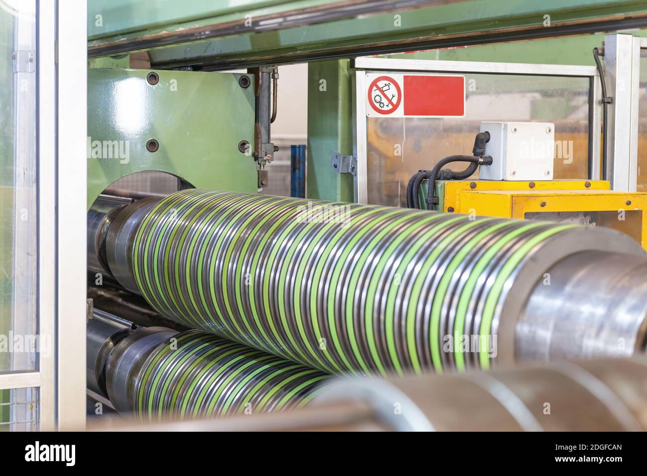 Coils cutter machine, industrial cutting procedure Stock Photo - Alamy