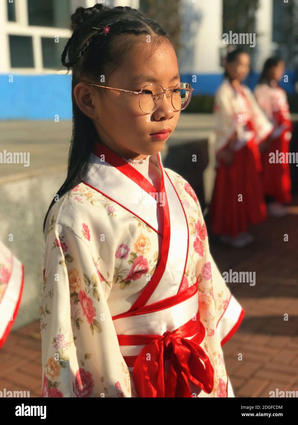 Primary school students dressed in Hanfu, a traditional Chinese folk ...
