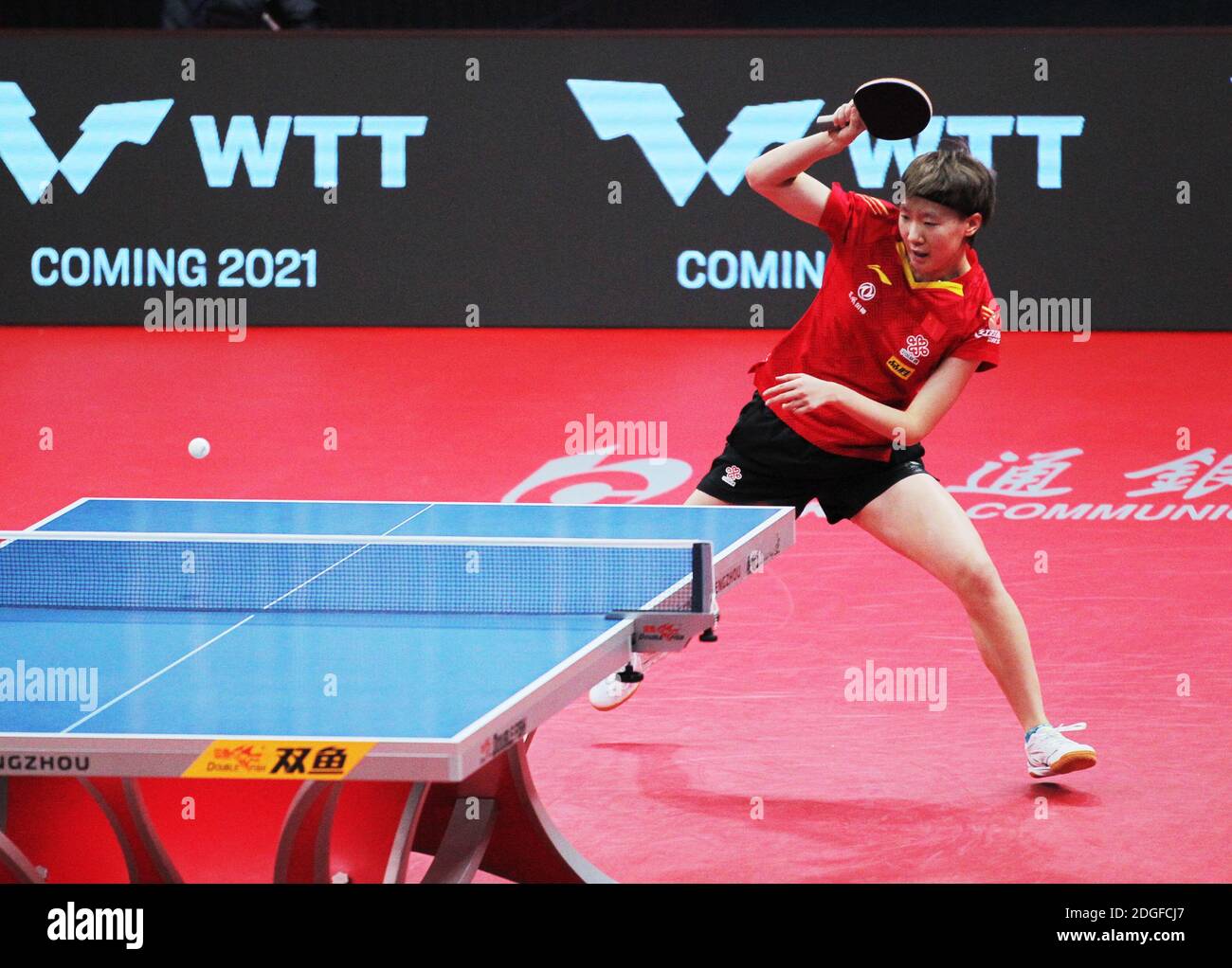 Chinese table tennis player Wang Manyu plays against Japanese table ...