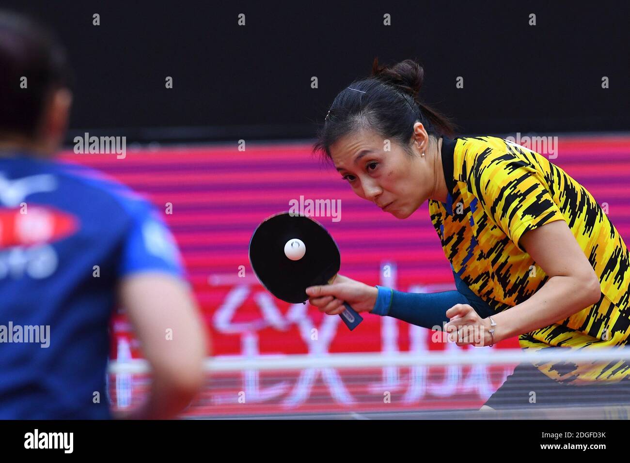German table tennis player Han Ying plays against Japanese table tennis ...