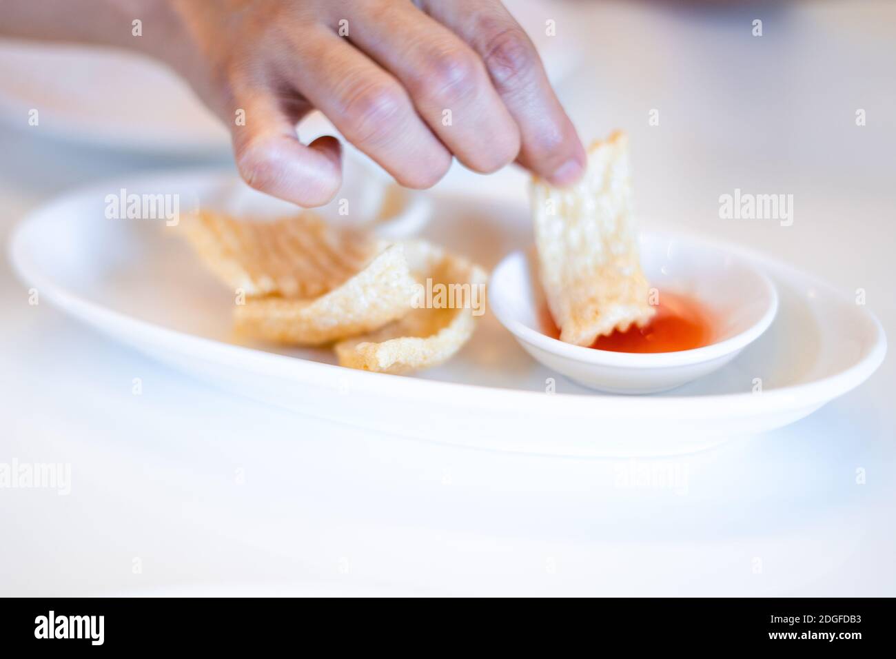 Crispy shrimp crackers with sweet chili dip sause for appetizer Stock ...