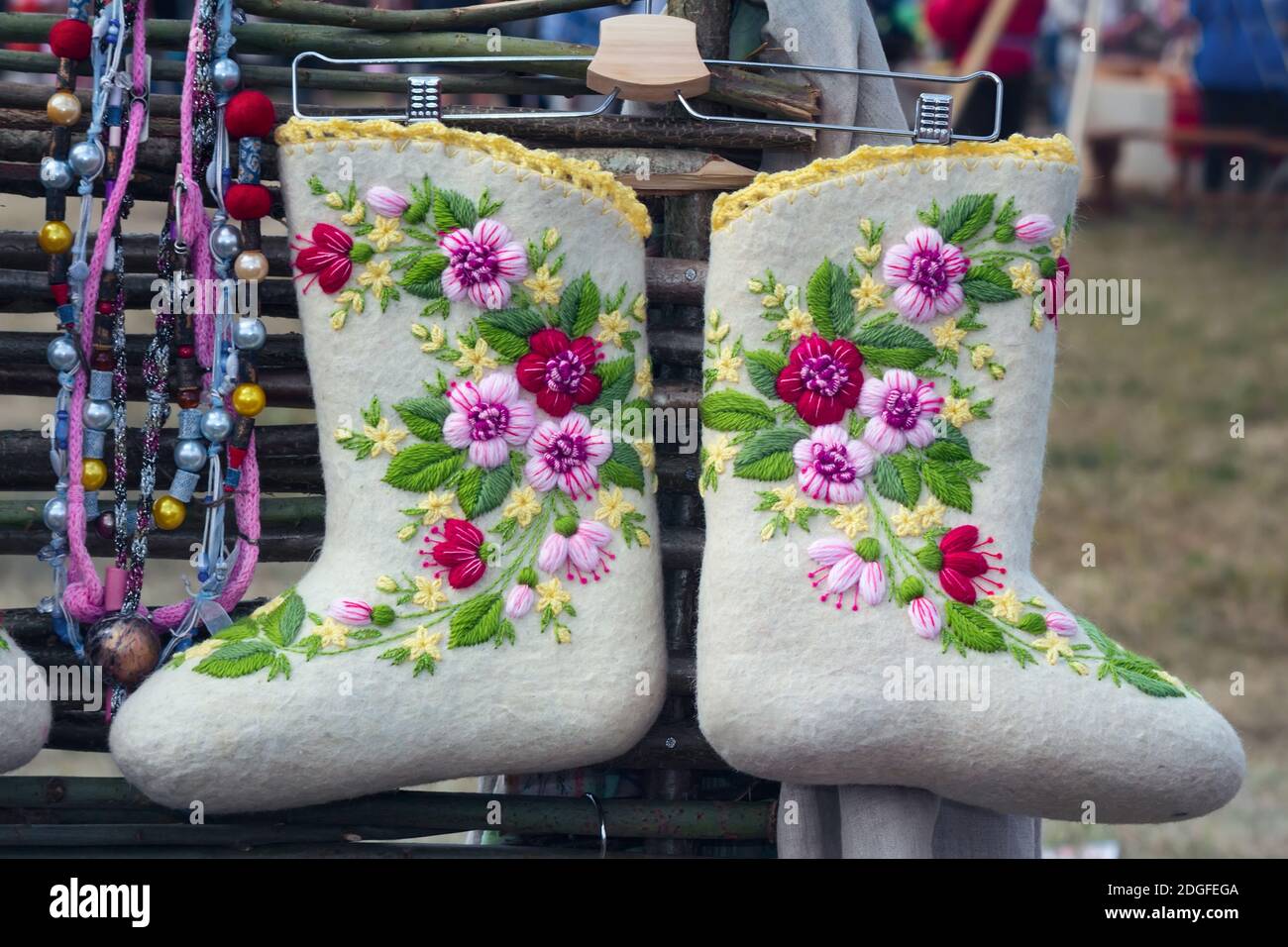 Beautiful warm shoes of felt in the national style Stock Photo - Alamy
