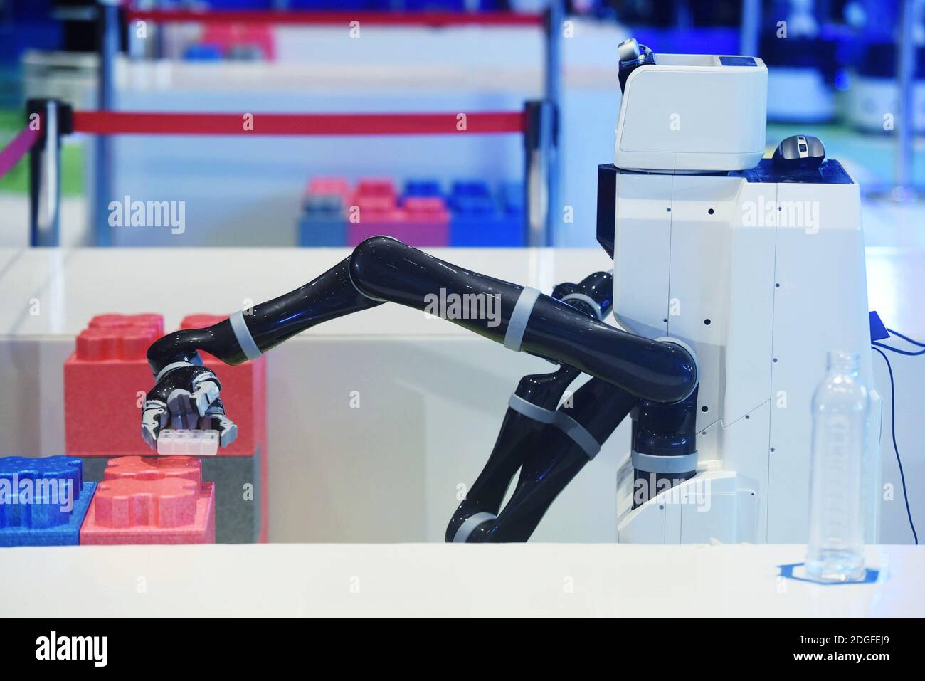 A robot hand carries cubicles at the 2020 RoboCom in Hangzhou city ...