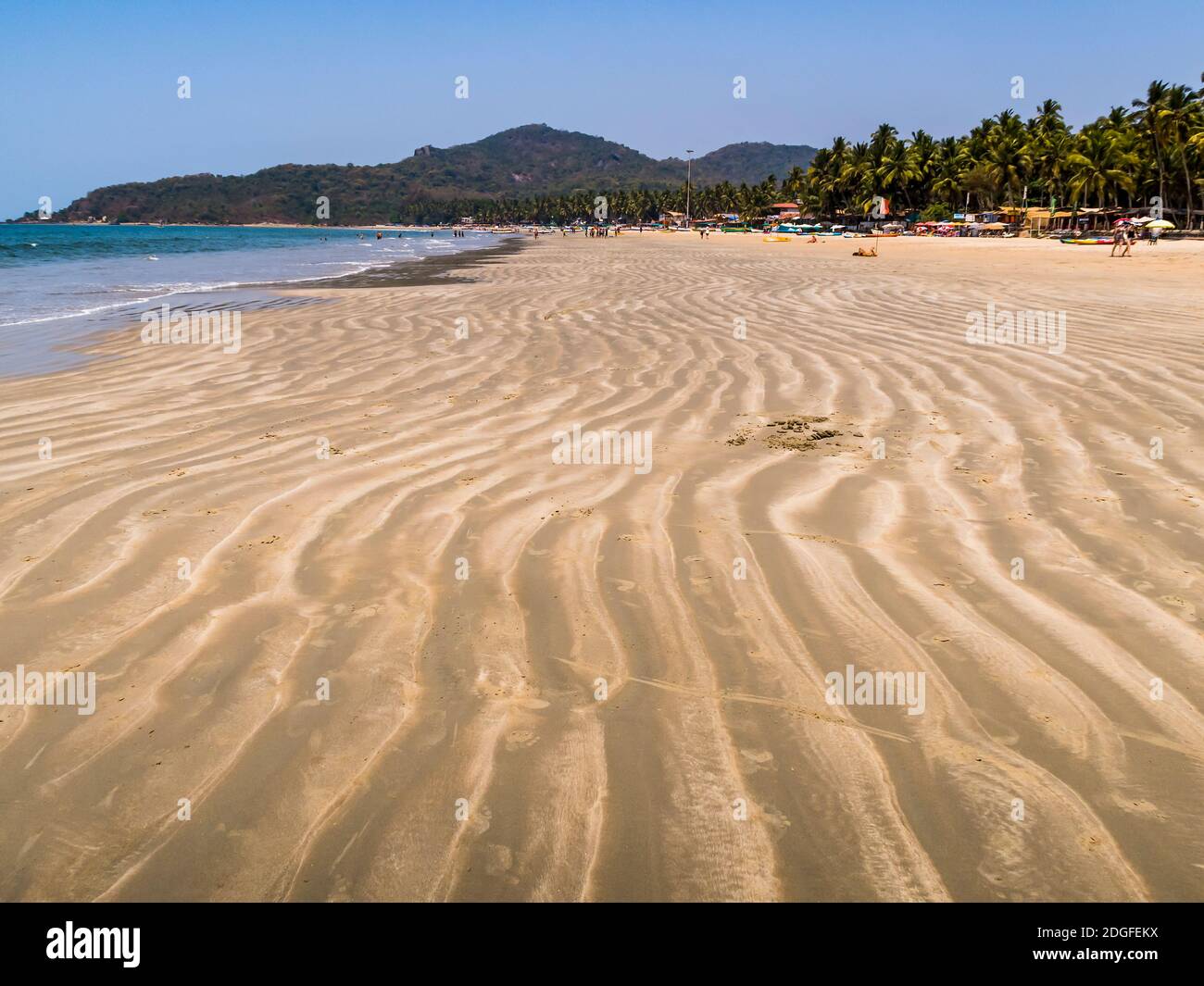 Sand waves on the beach after the Indian ocean low tide in Goa, India ...